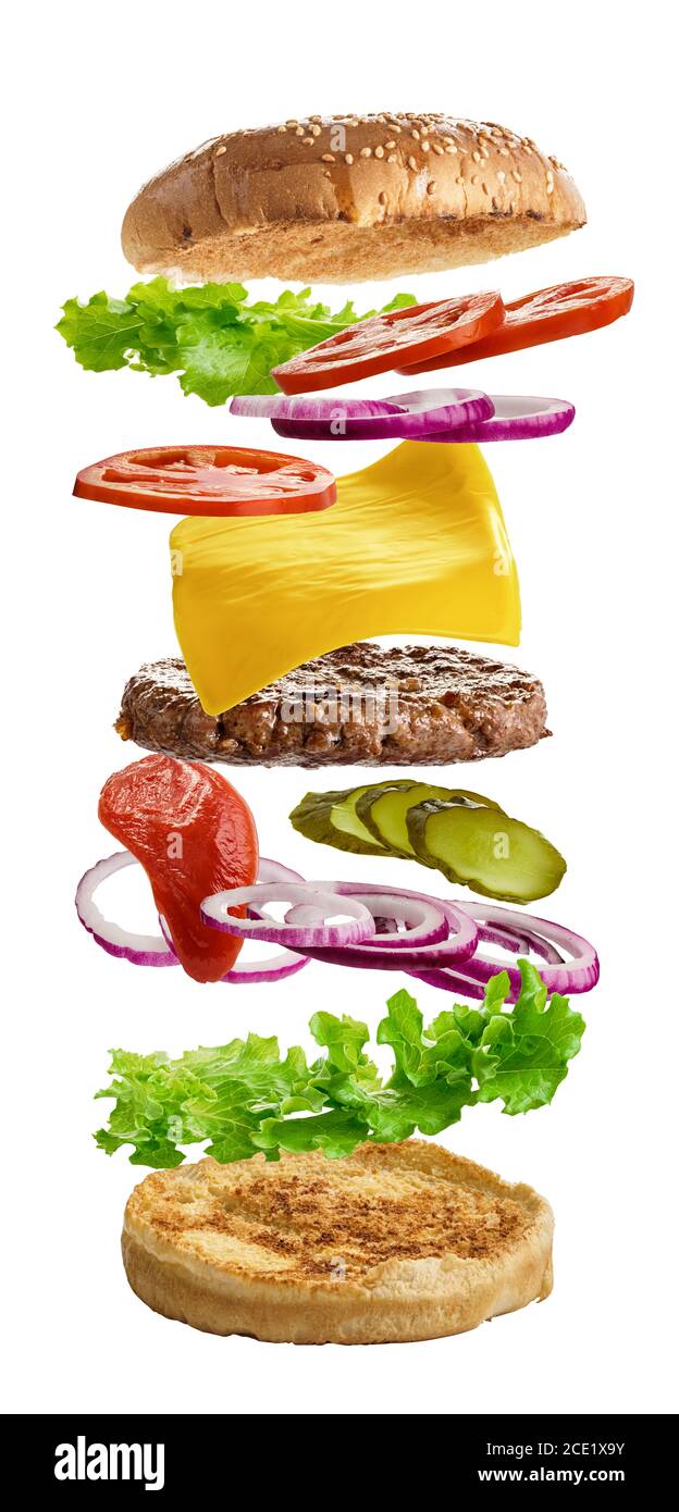 Burger ingredients floating Stock Photo - Alamy