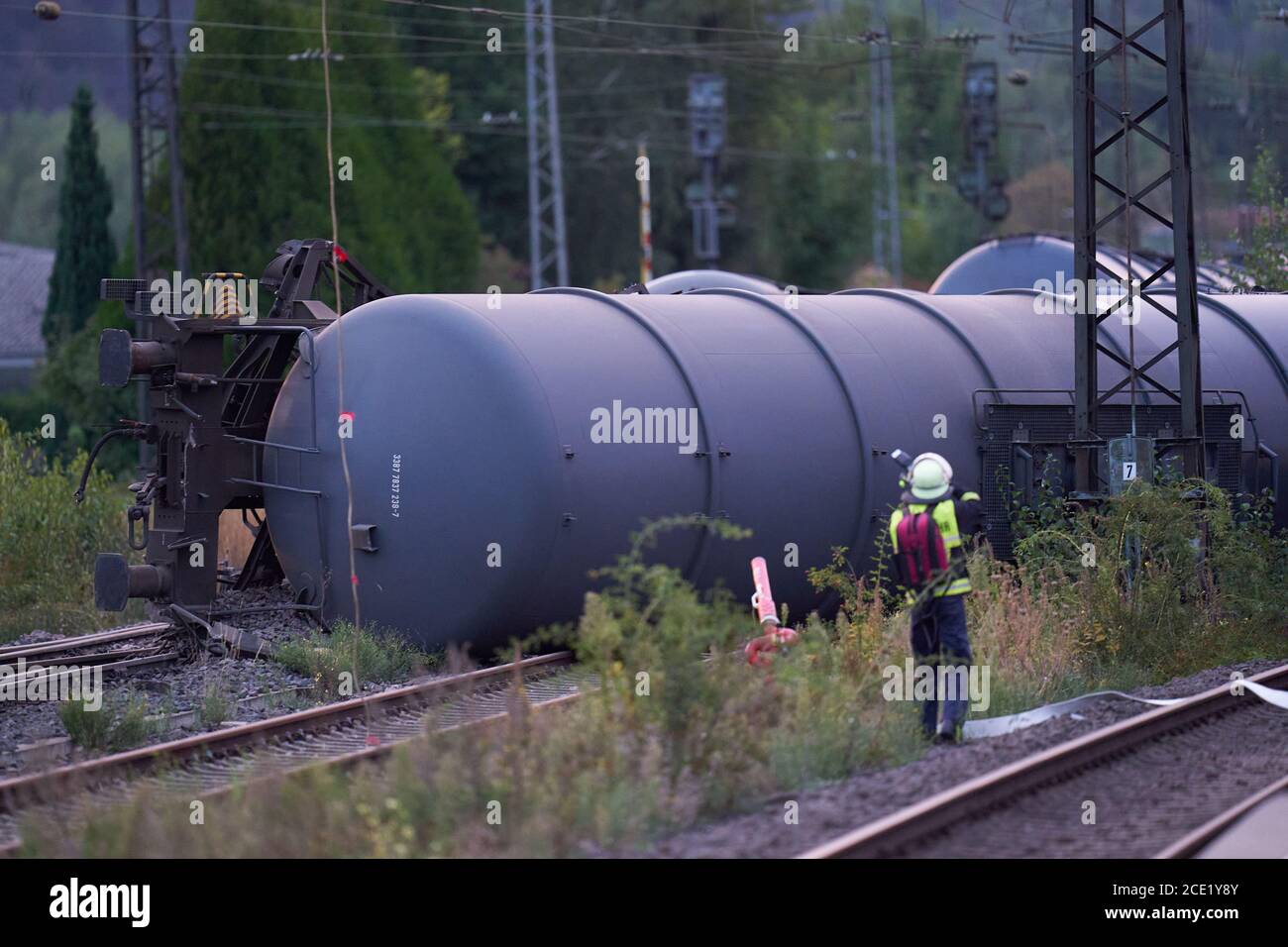 Lahnstein, Germany. 30th Aug, 2020. A derailed freight train loaded ...