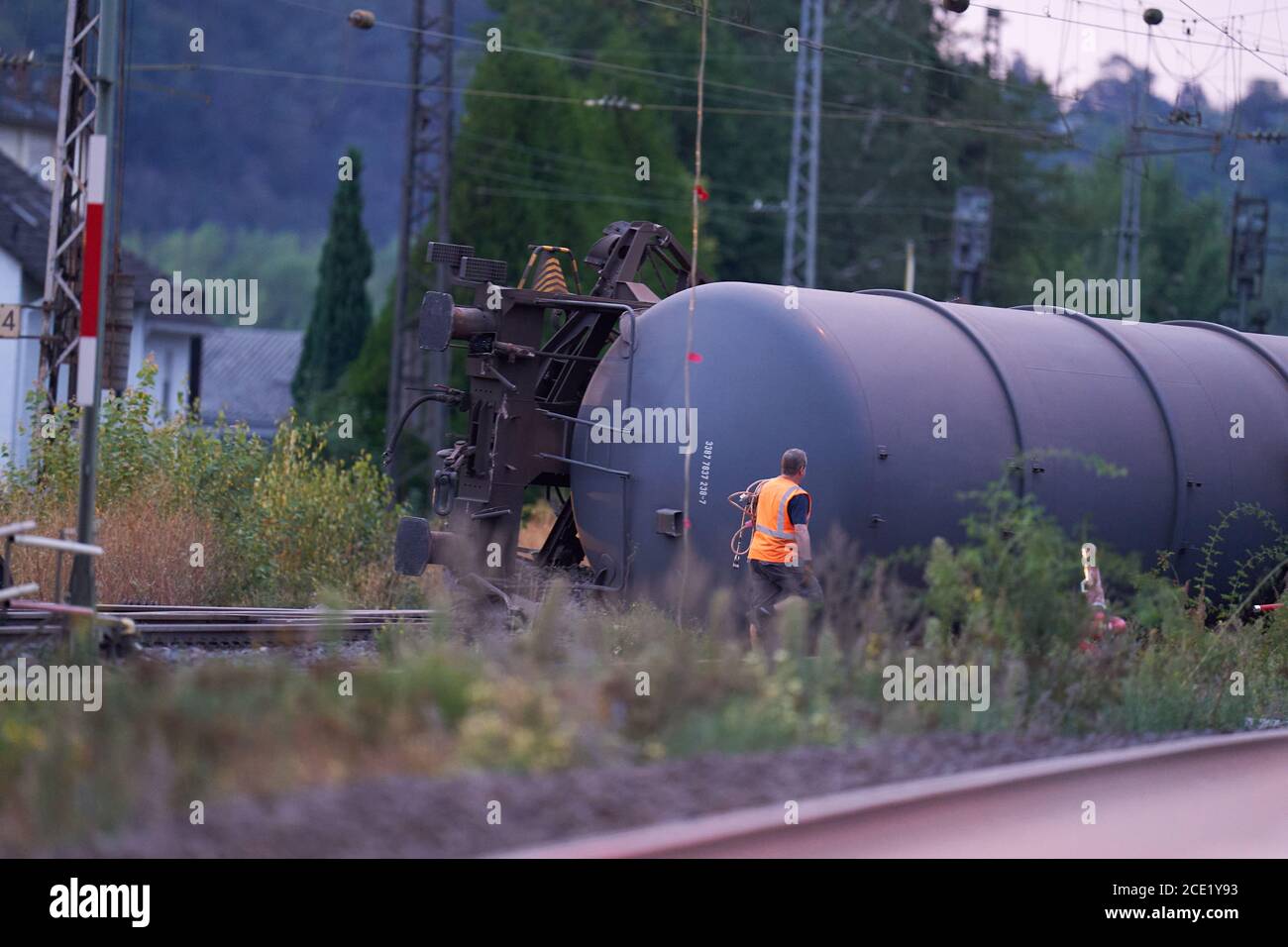 Lahnstein, Germany. 30th Aug, 2020. A derailed freight train loaded ...
