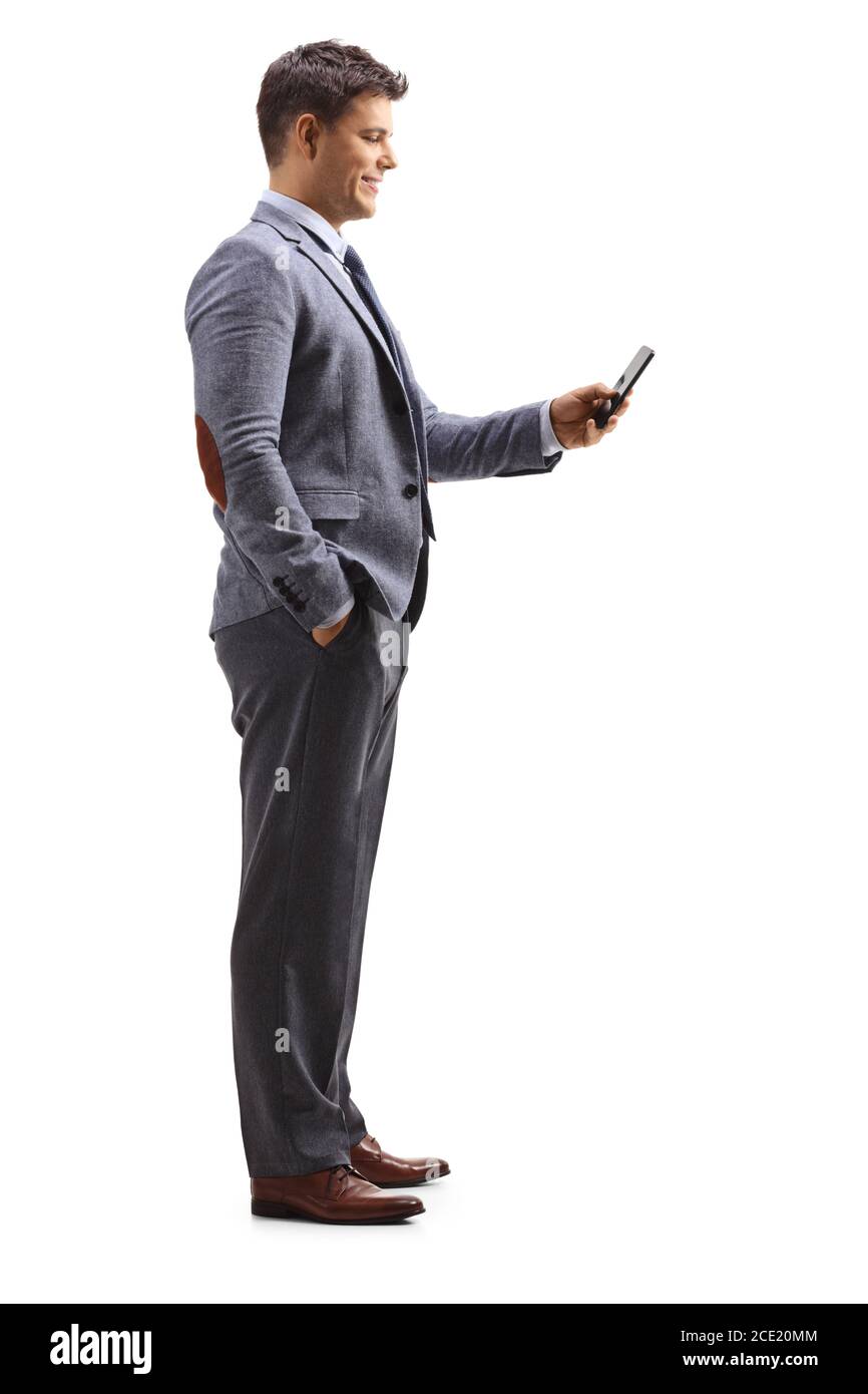 Young Man Standing In Suit