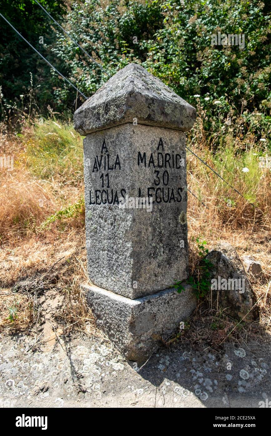 Old stone signal that indicates in leagues the distance between two ...