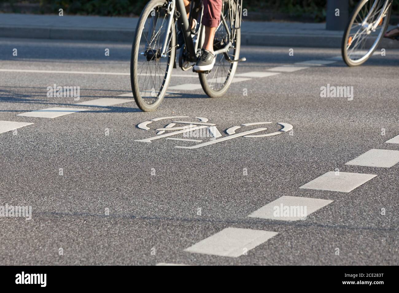 painted cycle lane on the street Stock Photo - Alamy