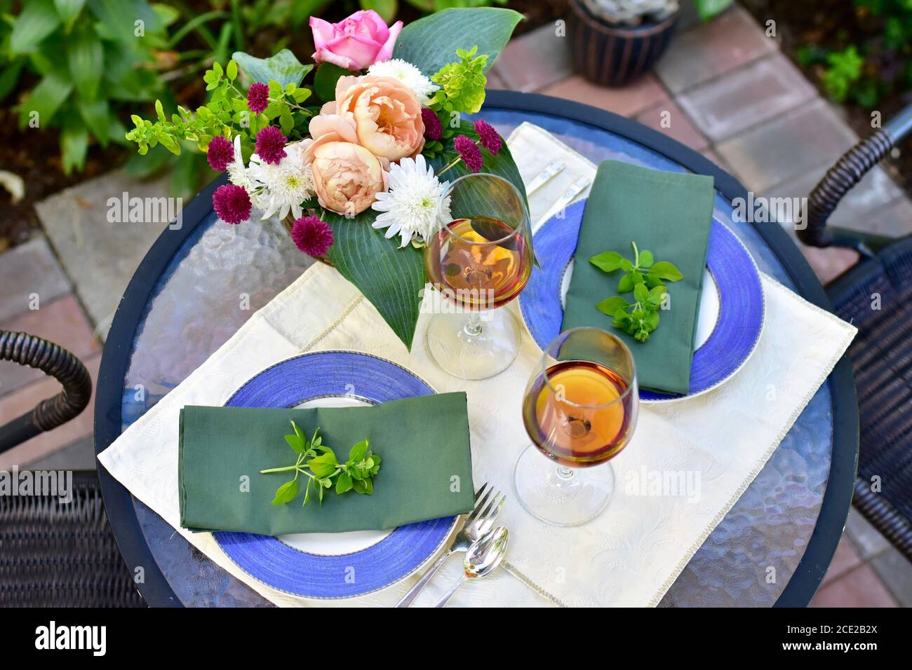 Secluded outdoor patio cafe setting in beautifully landscaped garden on ...
