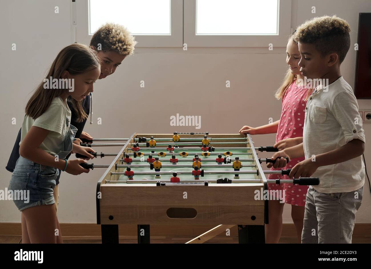 Family Playing Foosball