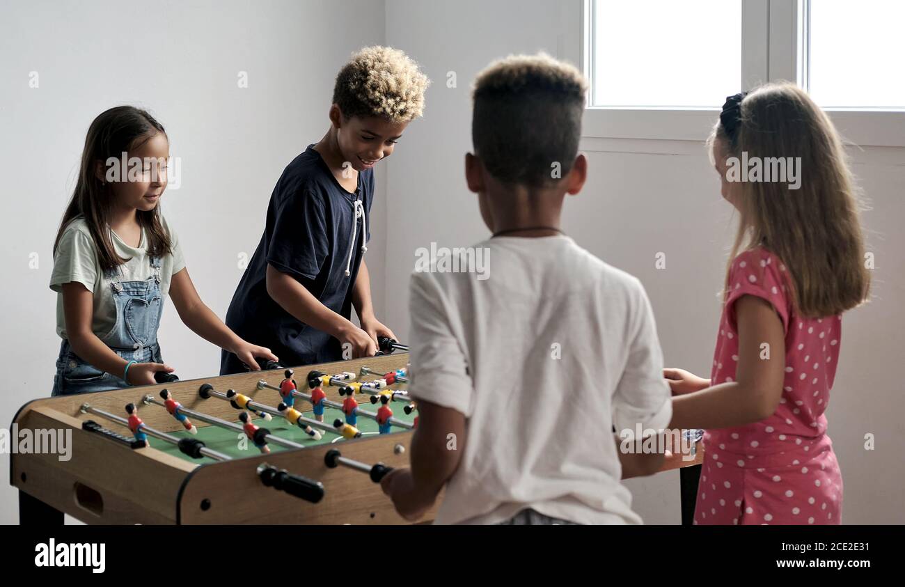 Boys playing football together hi-res stock photography and images - Alamy