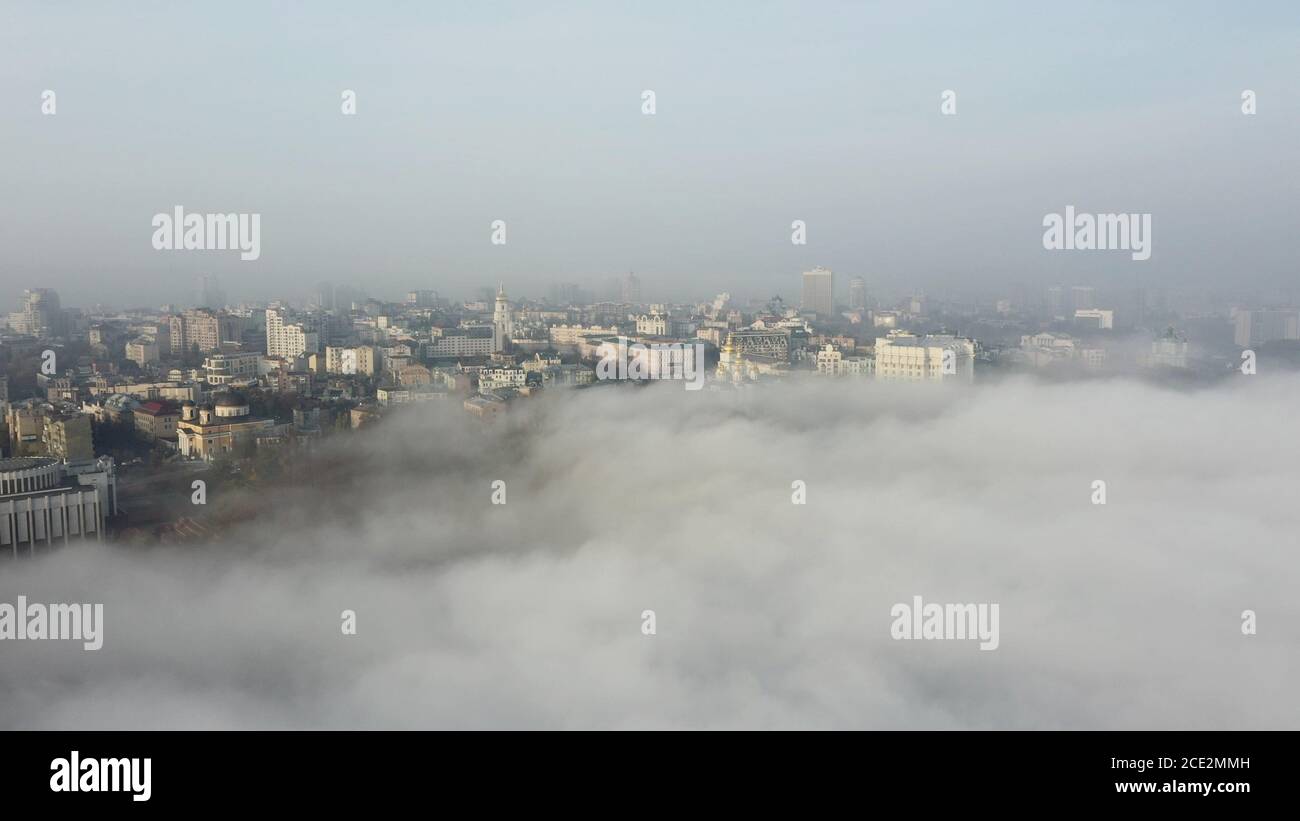 Aerial view of the city in the fog Stock Photo - Alamy