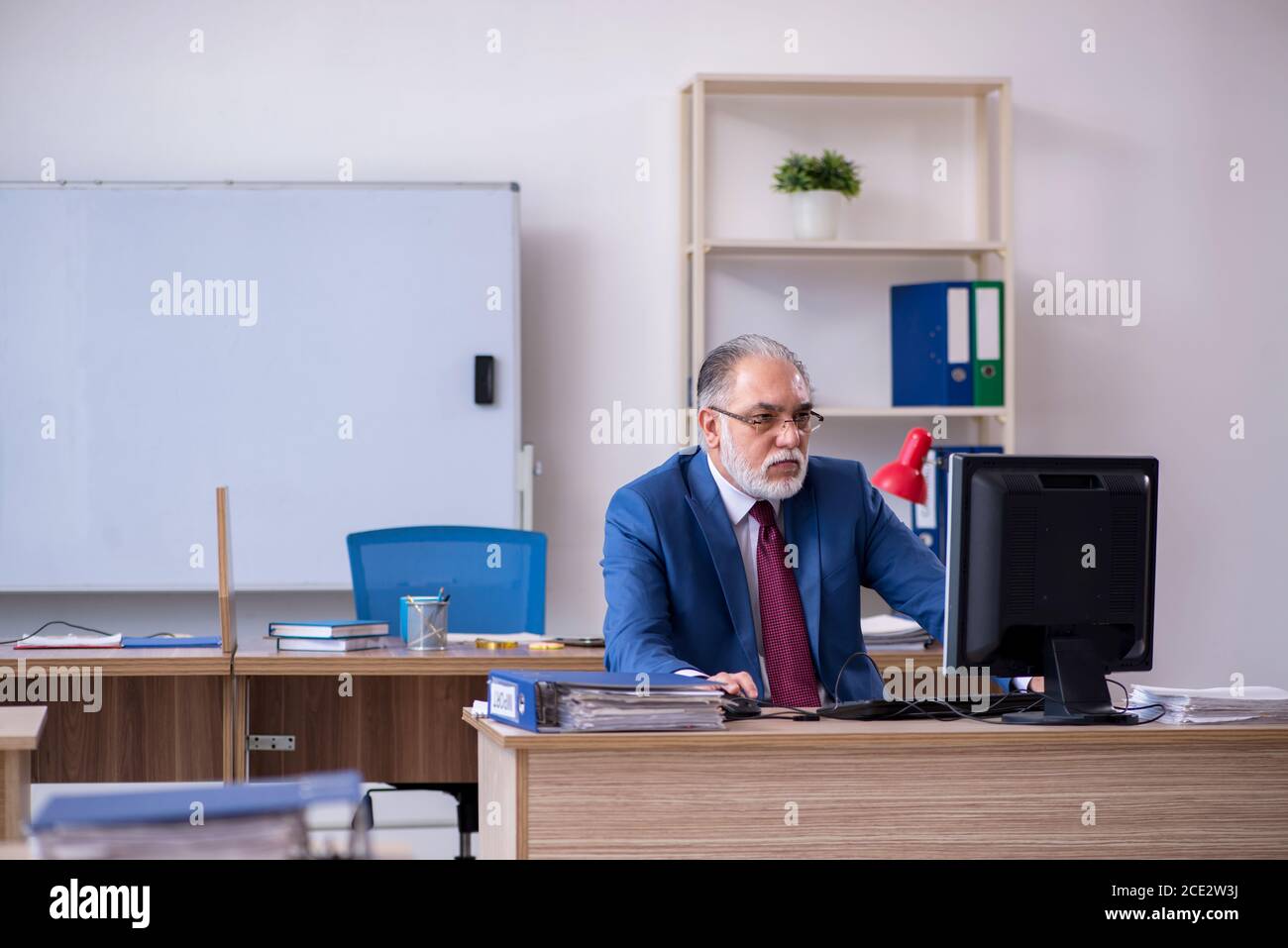 Male boss employee working in the office Stock Photo - Alamy