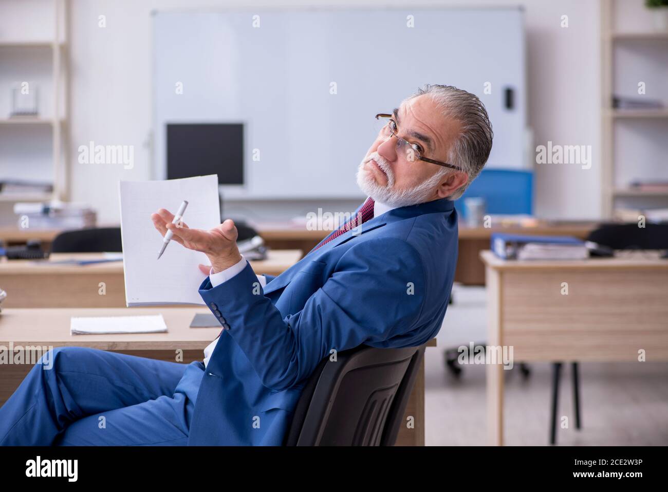 Male boss employee working in the office Stock Photo - Alamy