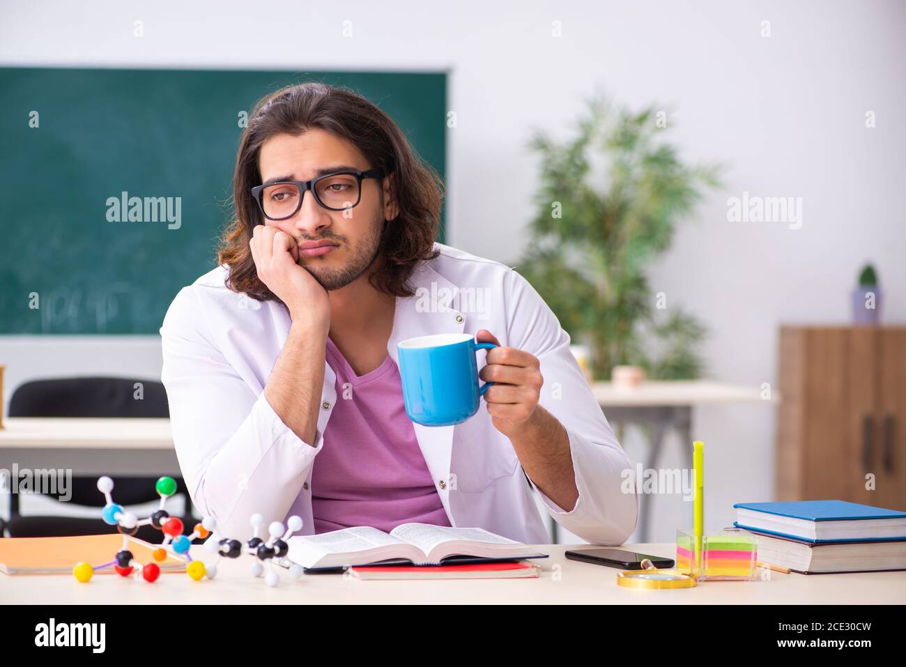 Young physicist in the classroom Stock Photo - Alamy
