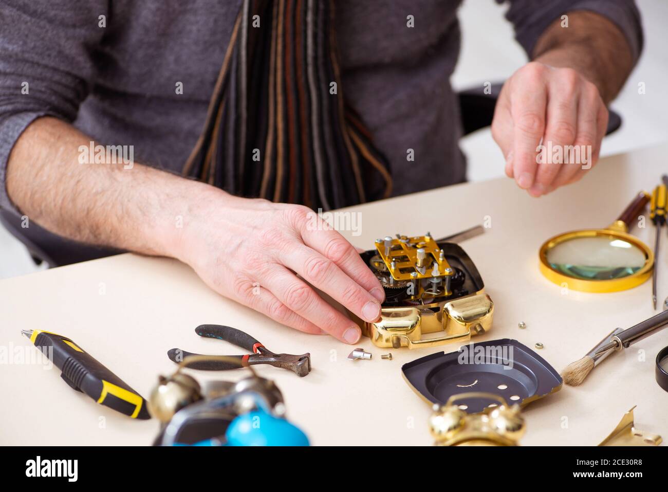 Watch repair desk hi-res stock photography and images - Alamy