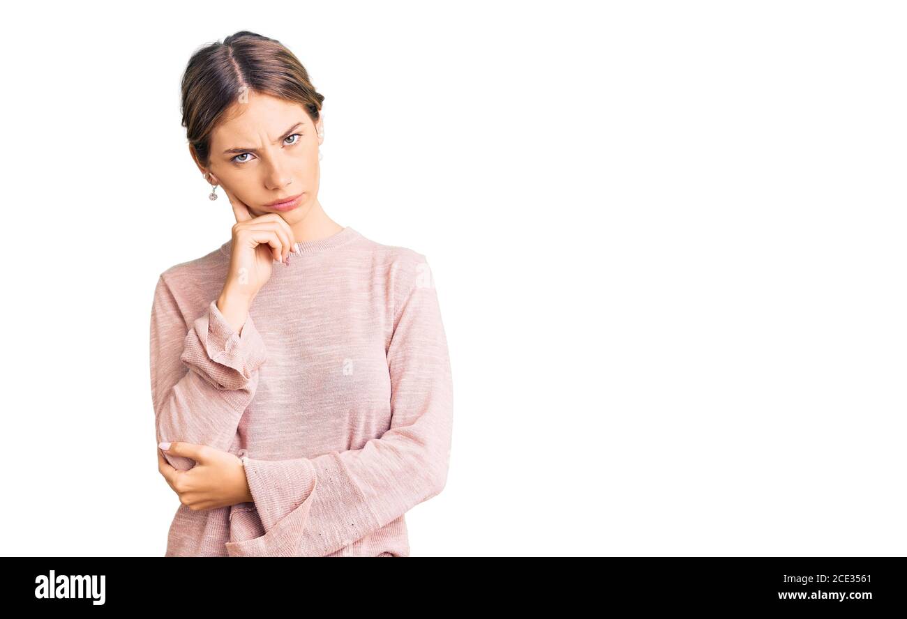 Beautiful caucasian woman with blonde hair wearing casual winter ...