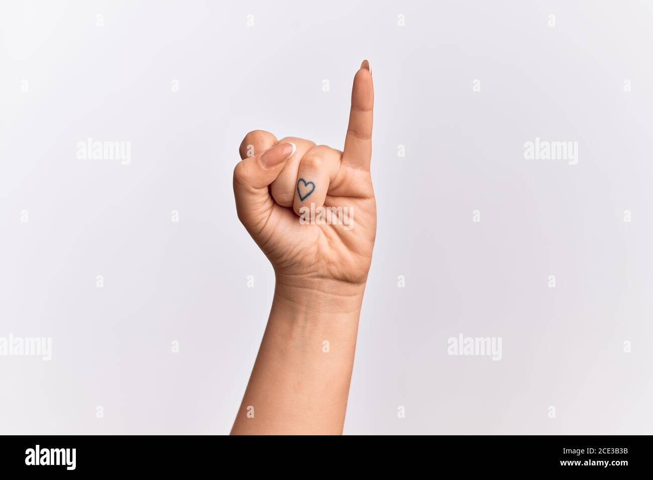 Hand of caucasian young woman showing little finger as pinky promise ...