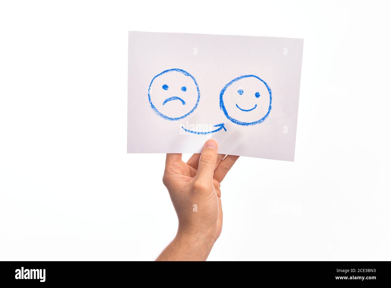 Cardboard banner with sad and happy face, depression problems over ...
