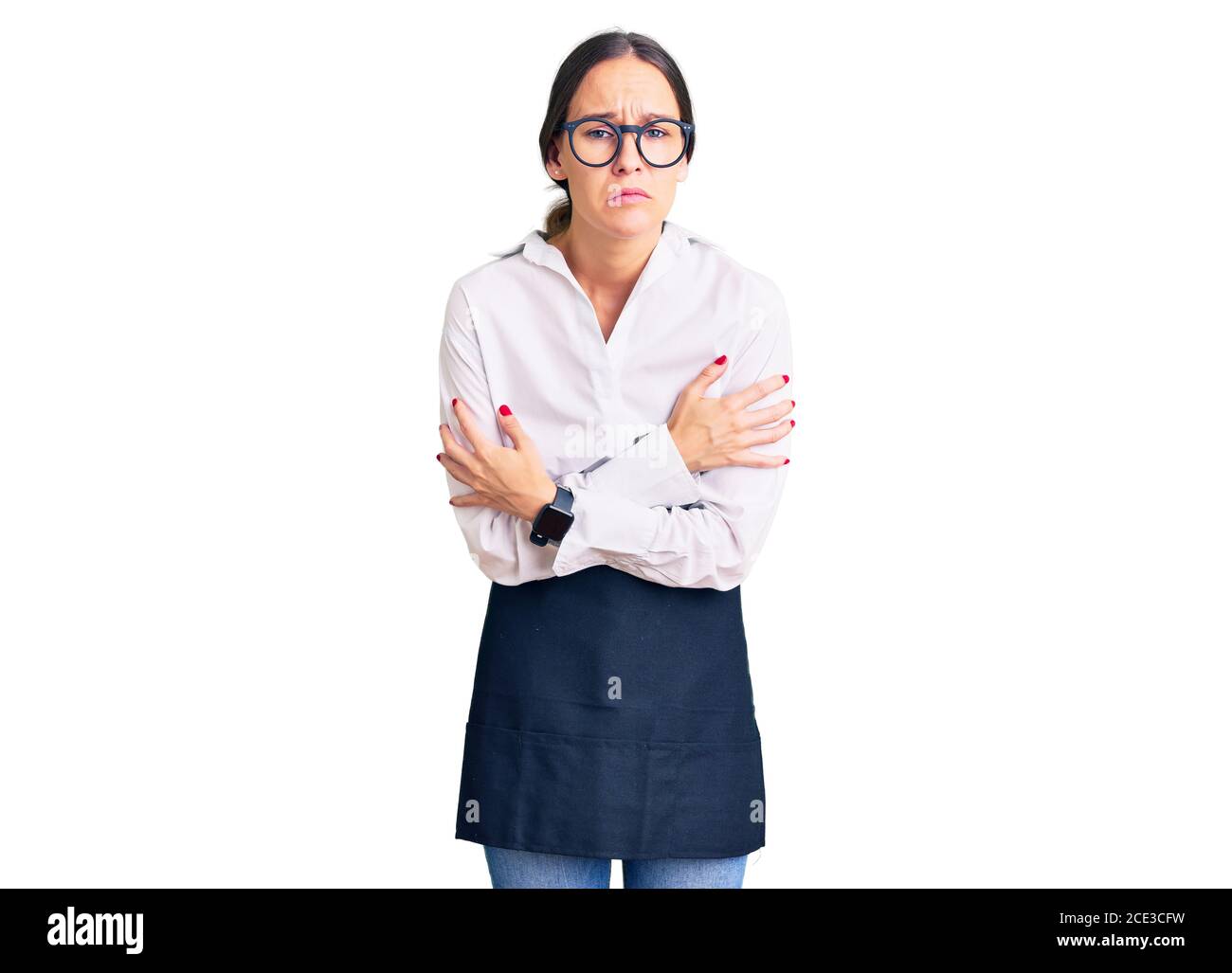 Beautiful brunette young woman wearing professional waitress apron ...