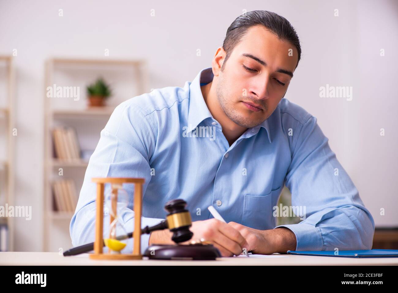 Young man in the courthouse in divorcing concept Stock Photo - Alamy