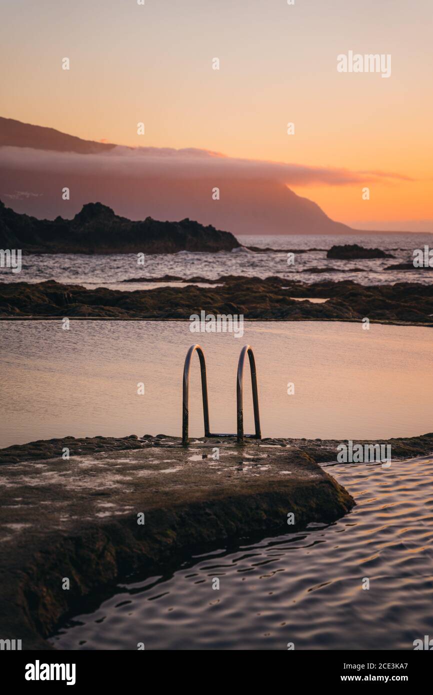 Beautiful natural pools with calmed waters at sunset. Relaxing ...