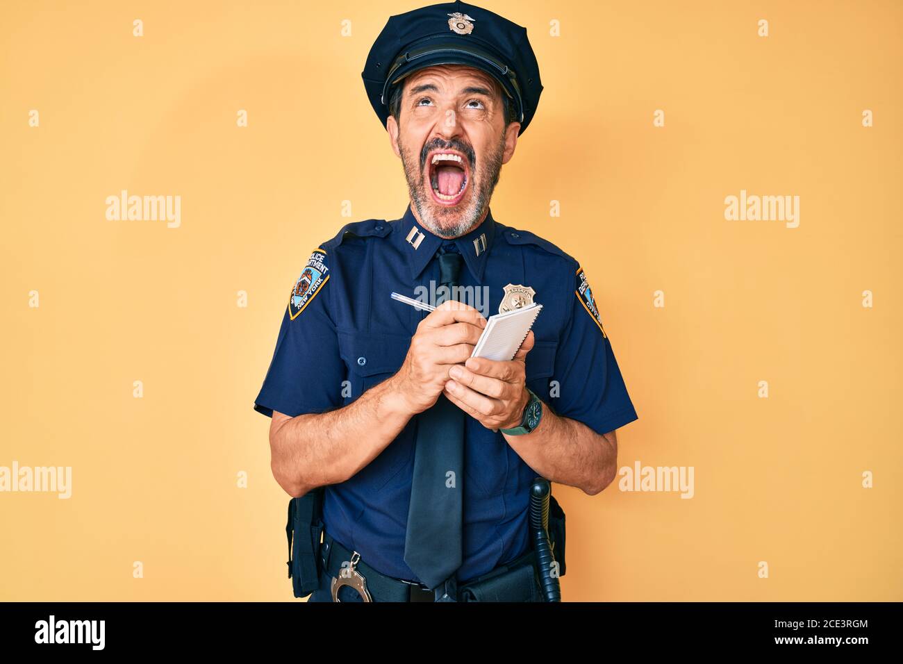 Hispanic police officer ticket hi-res stock photography and images - Alamy