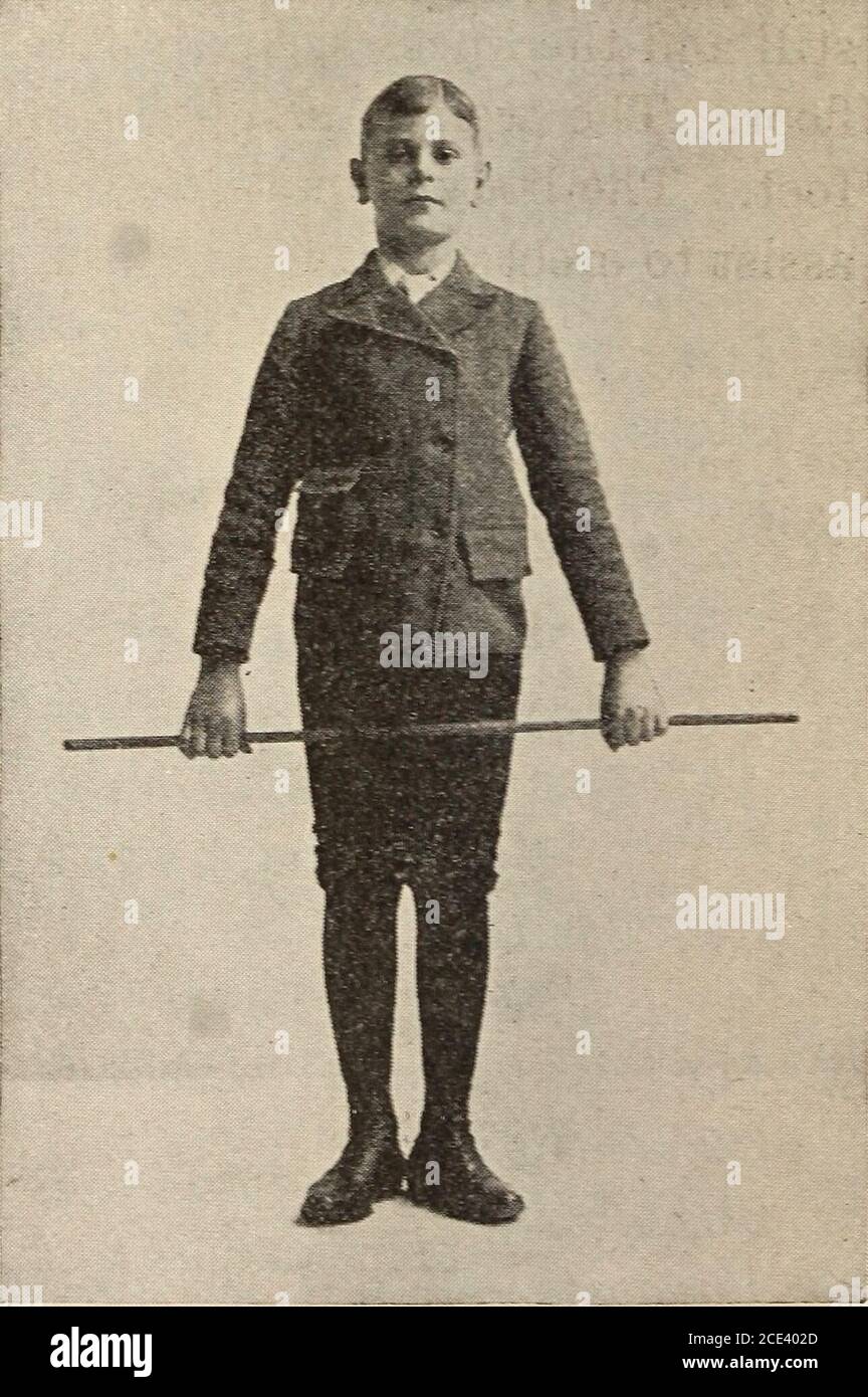 . School gymnastics with light apparatus . WAND IN POSITION FOBWORK In ...