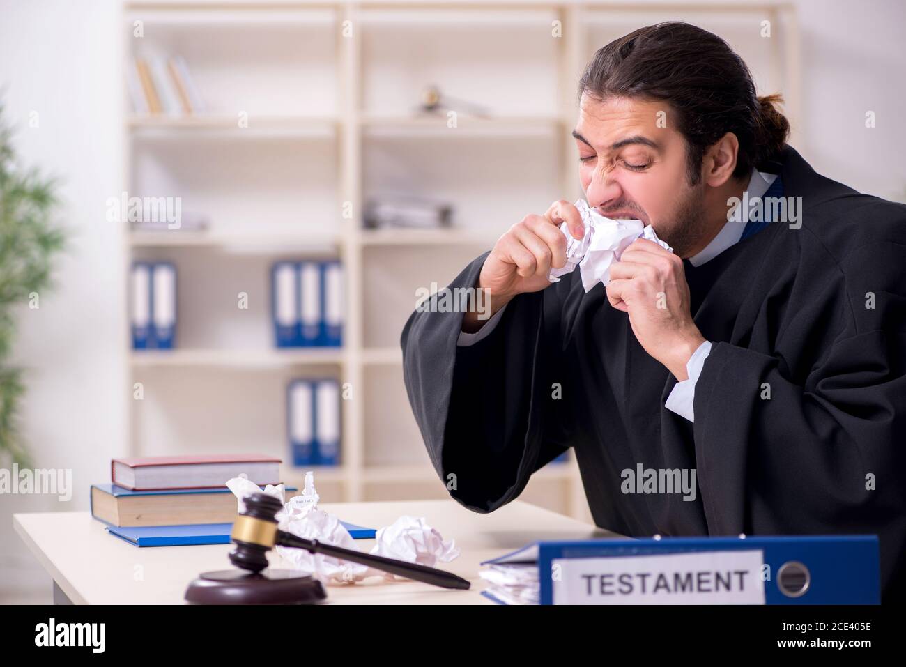 Young judge working in courthouse Stock Photo - Alamy
