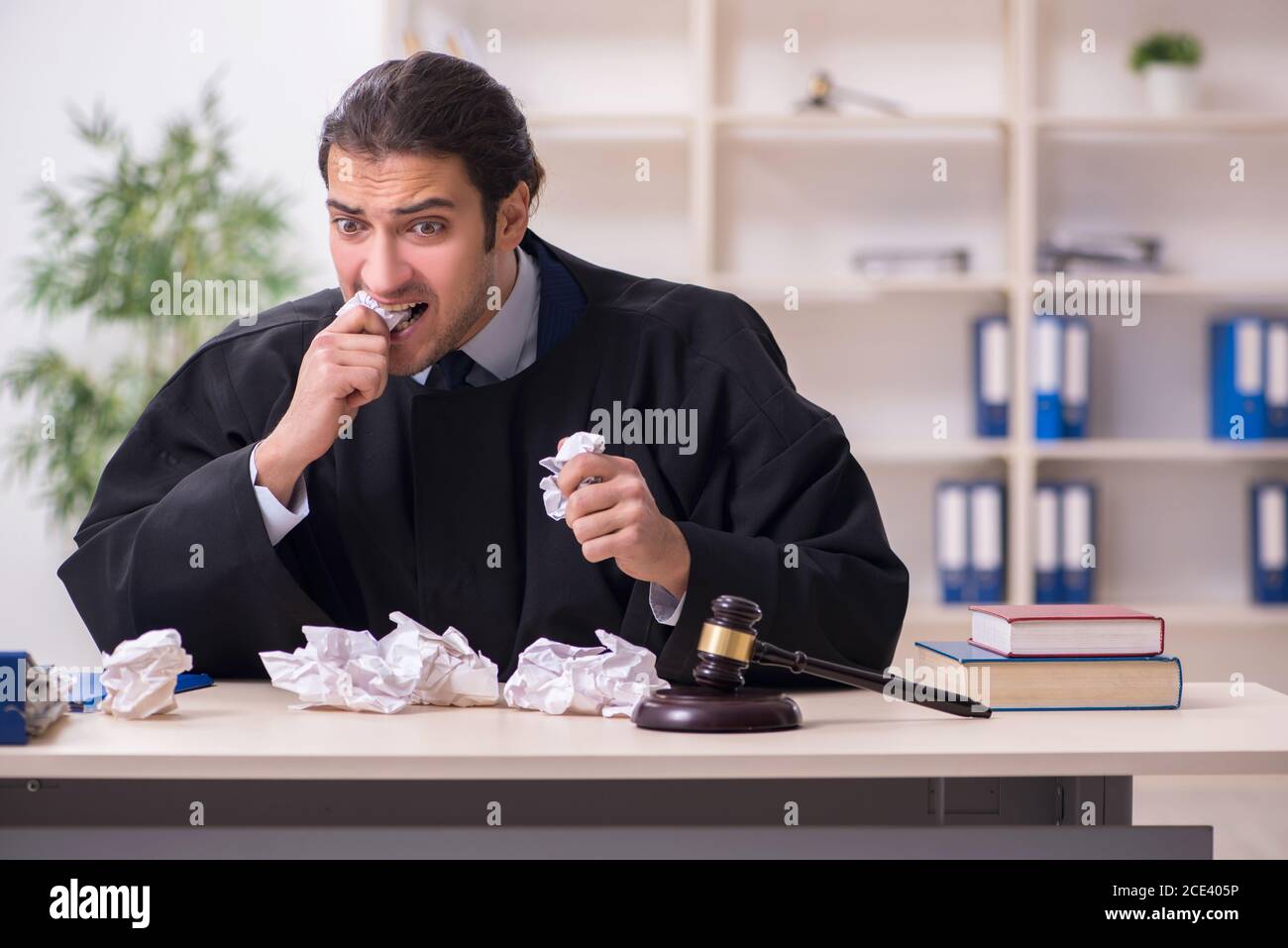 Young judge working in courthouse Stock Photo - Alamy