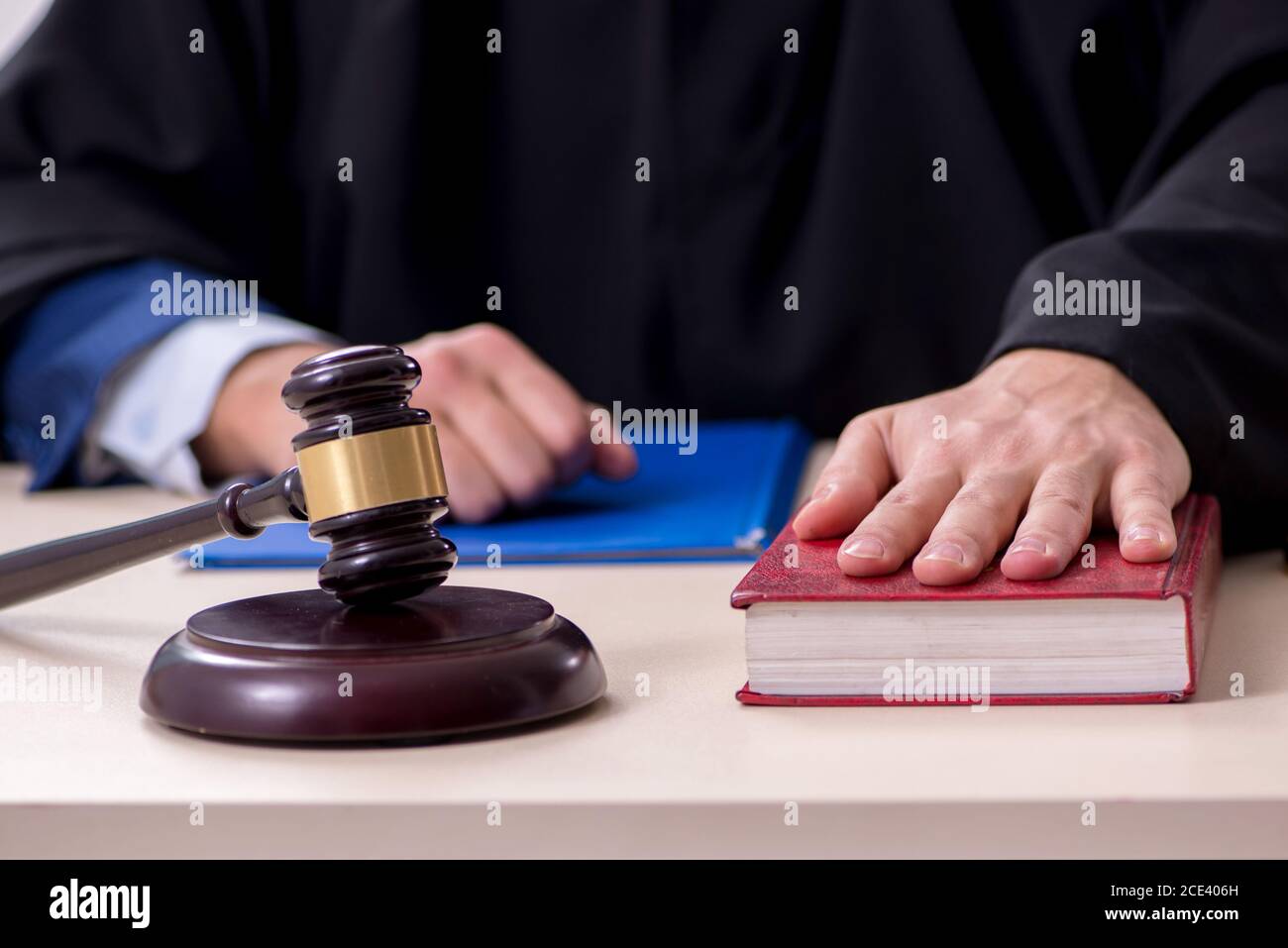 Young judge working in courthouse Stock Photo - Alamy