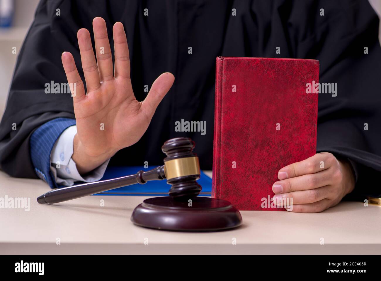 Young judge working in courthouse Stock Photo - Alamy