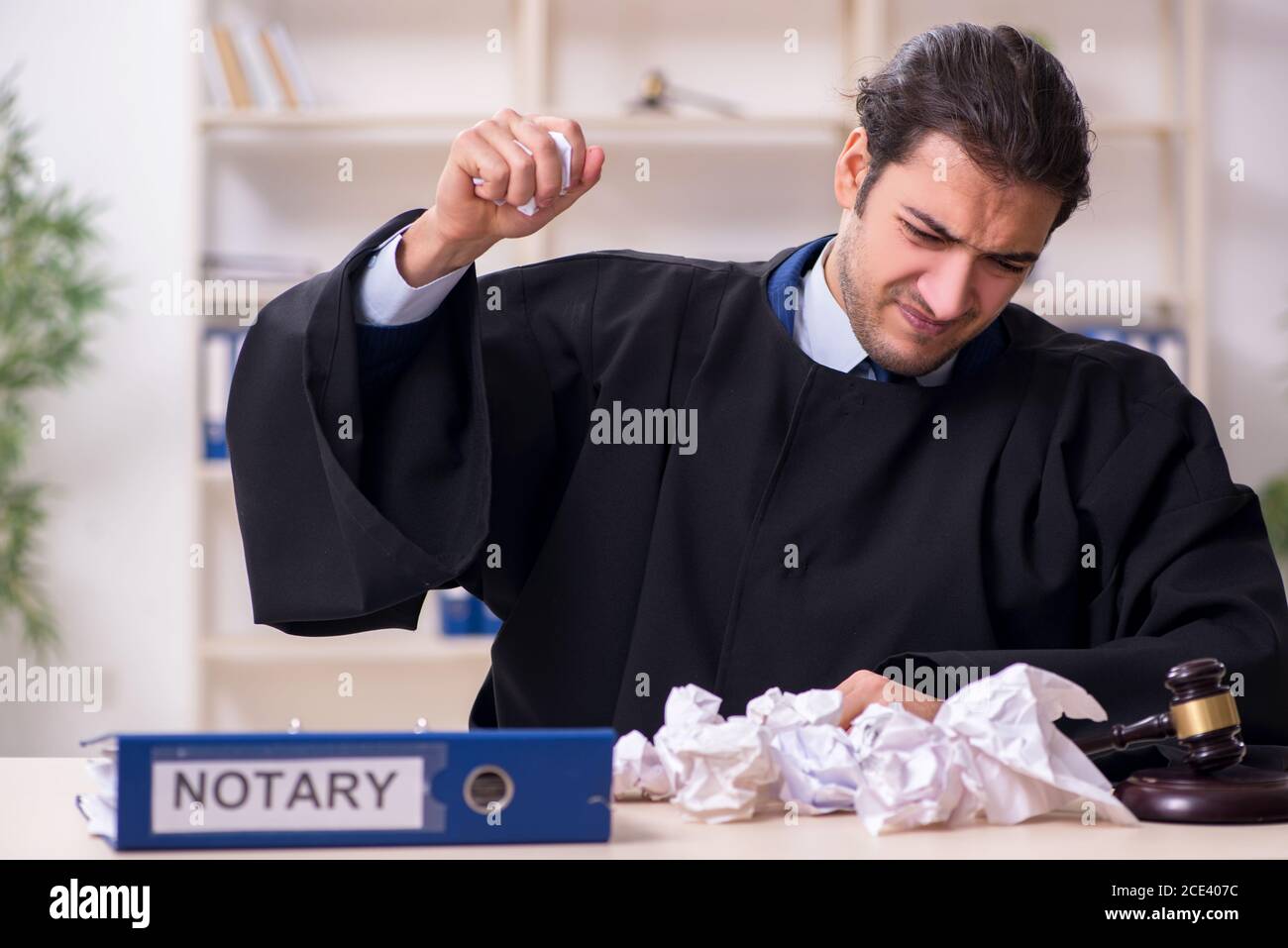 Young judge working in courthouse Stock Photo - Alamy