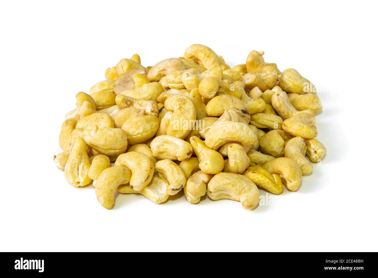 Roasted cashew nuts isolated on white background. Front views, close-up ...
