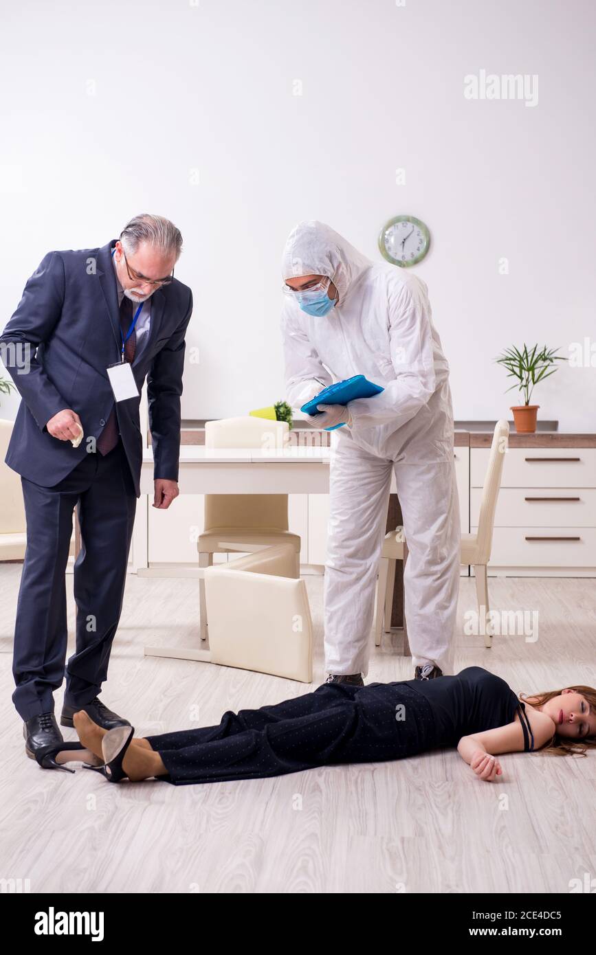 Forensic experts at the crime scene at home Stock Photo - Alamy