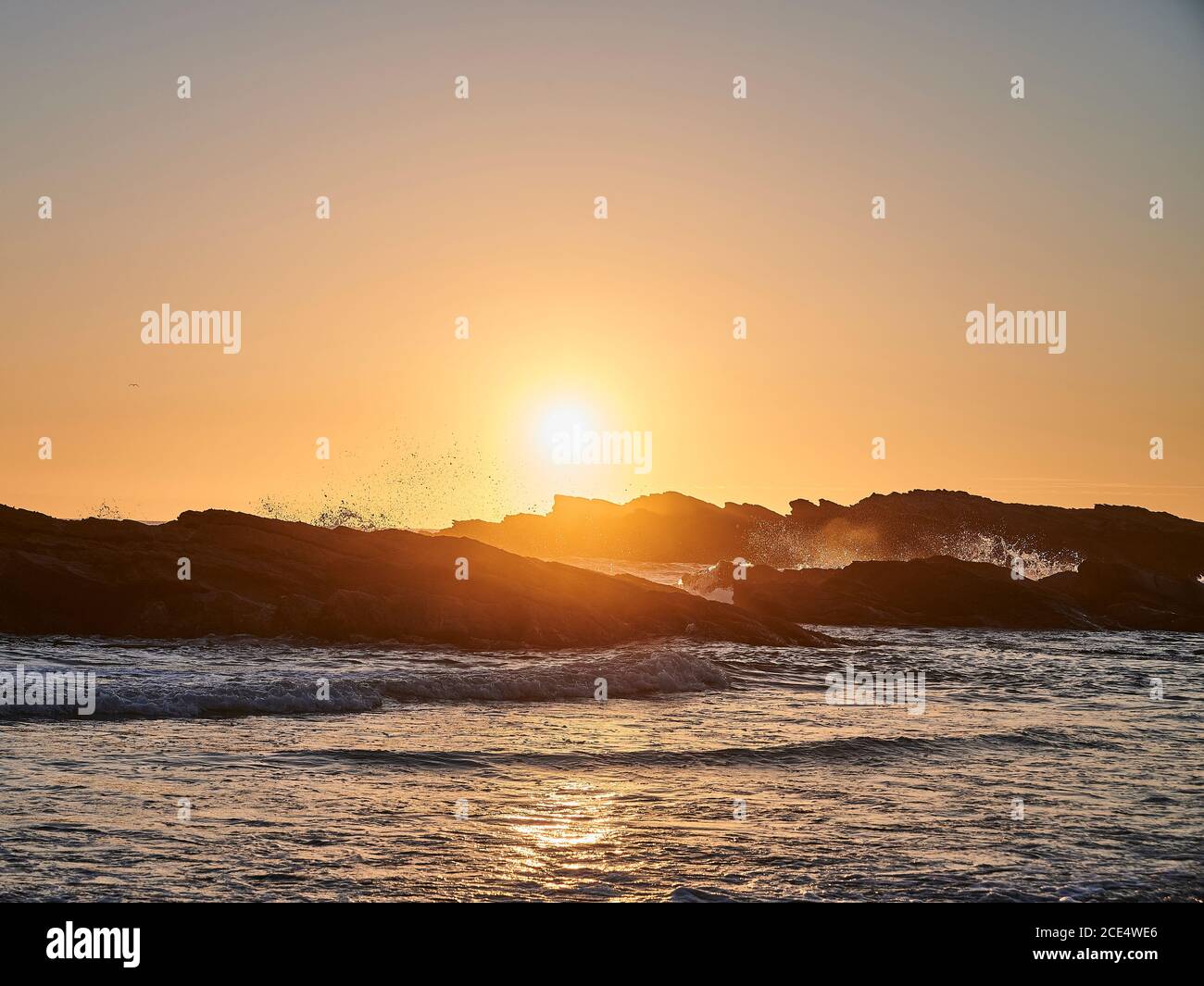 sun setting on the sea Stock Photo - Alamy