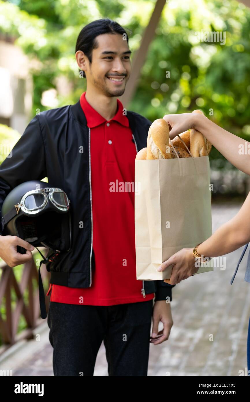 Man pick up hi-res stock photography and images - Alamy