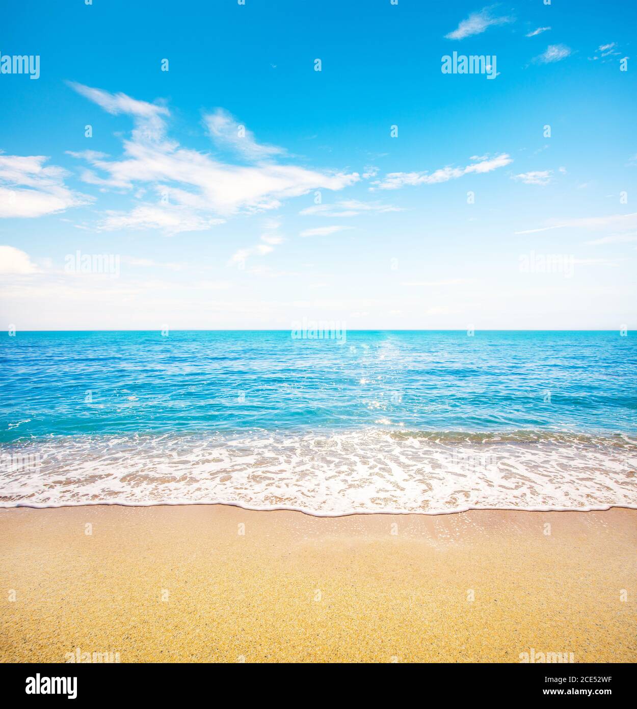 beautiful tropical beach and beautiful waves Stock Photo - Alamy