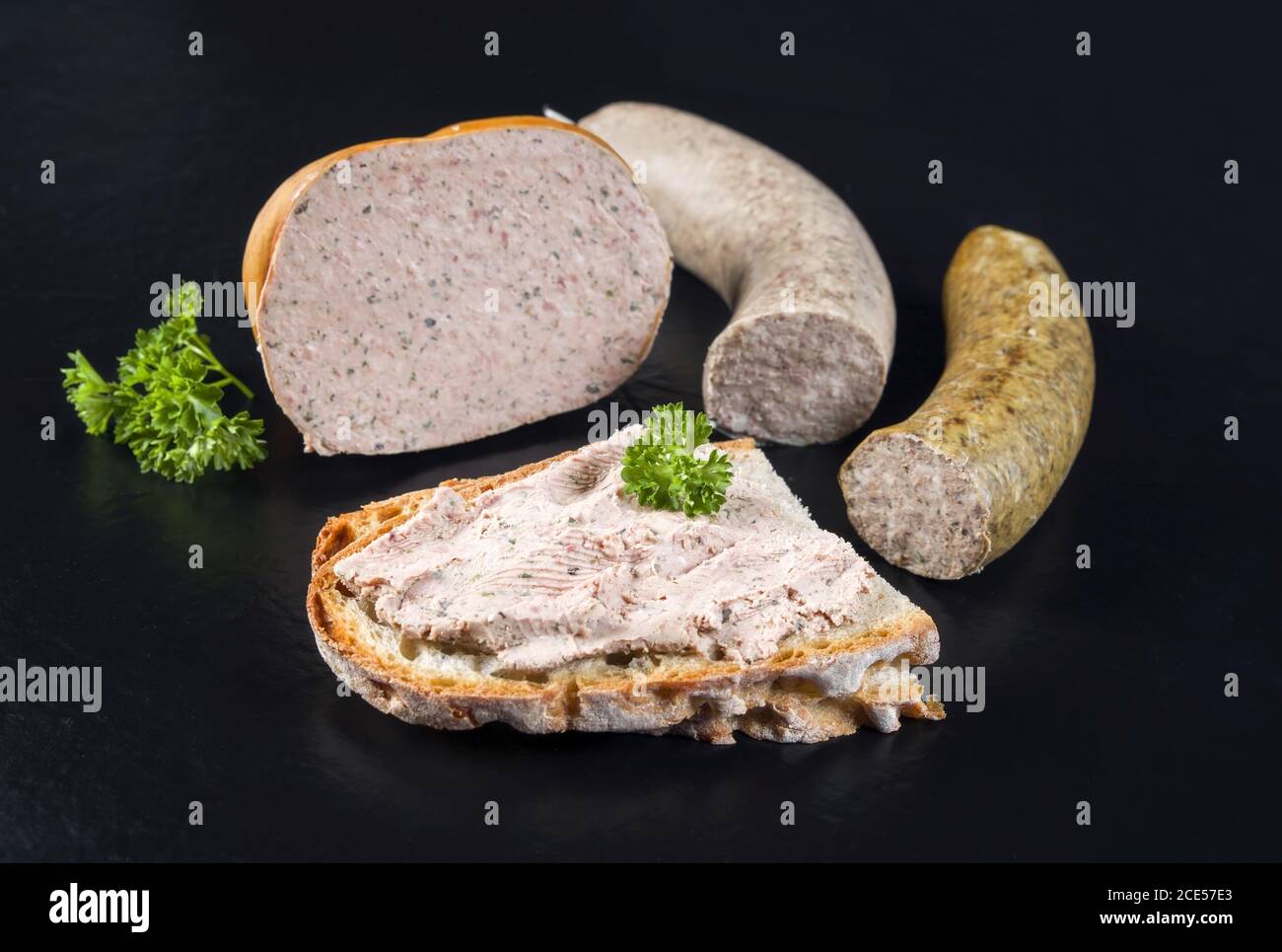 Traditional German meat paste with farmhouse bread offered as closeup ...