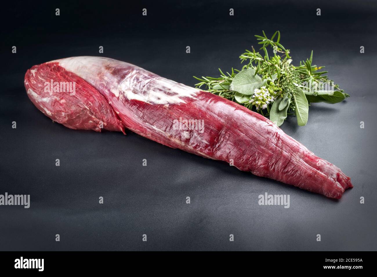 Dry aged beef fillet steak natural as closeup on black background with ...