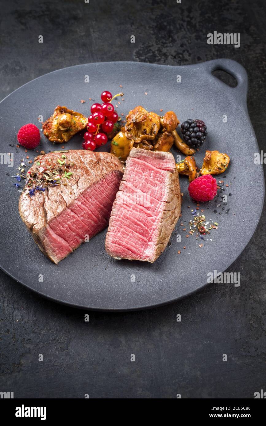 Fried dry aged beef fillet chateaubriand medallion steak natural with ...