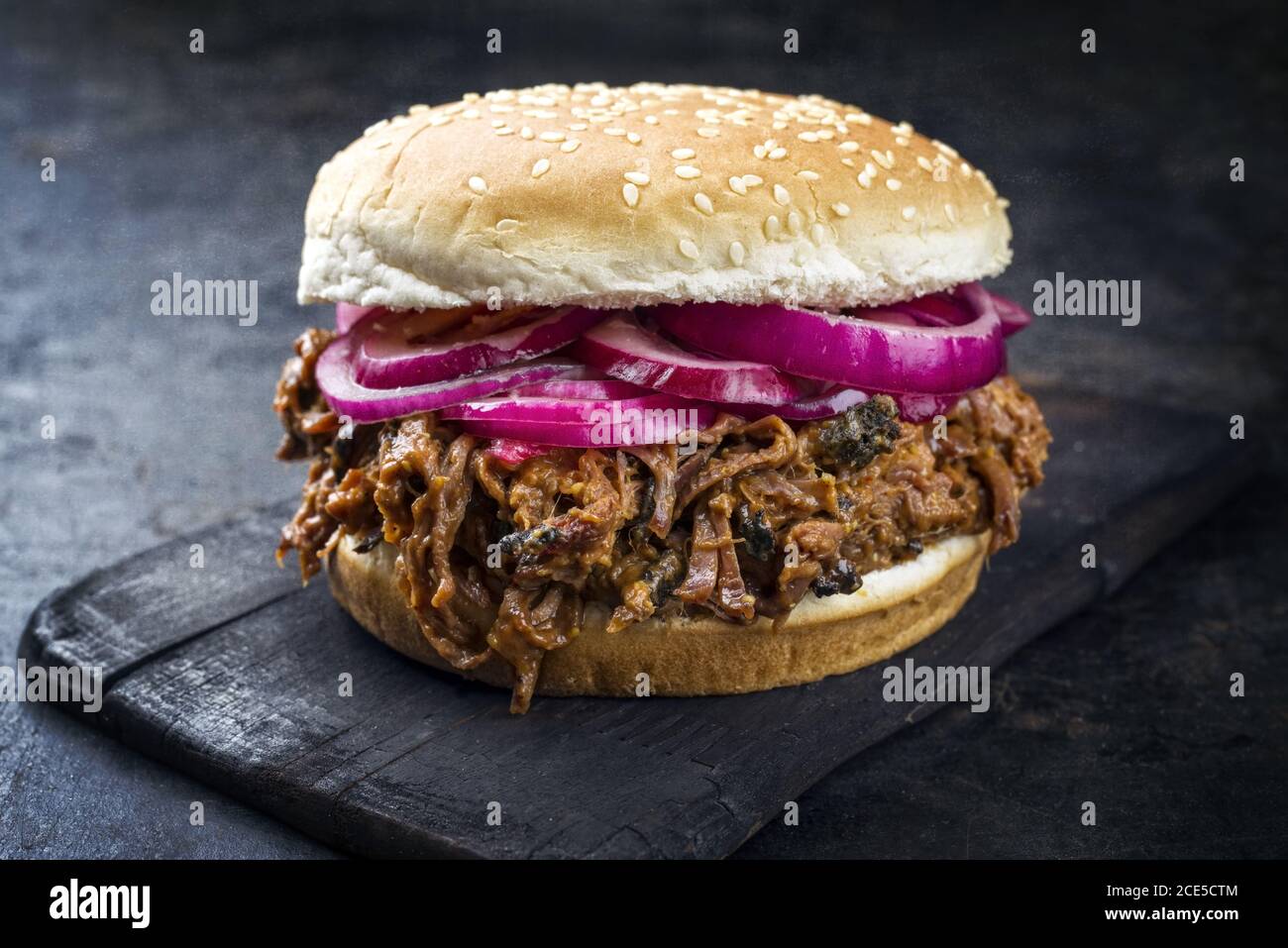 Traditional barbecue pulled beef burger offered with Carolina BBQ sauce ...