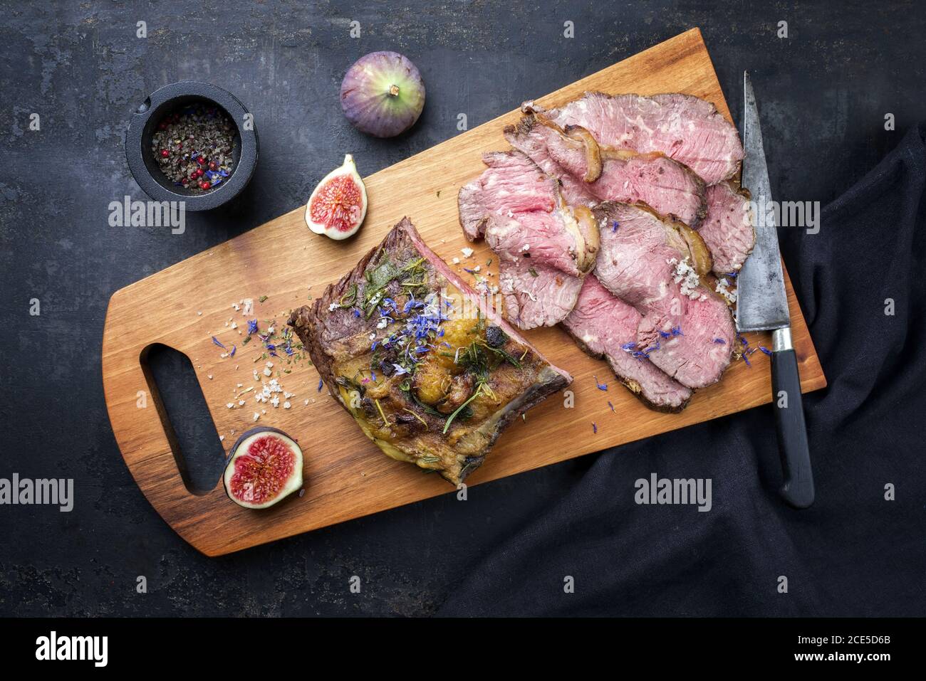 Traditional lunch meat with sliced cold cuts roast beef with gherkin ...