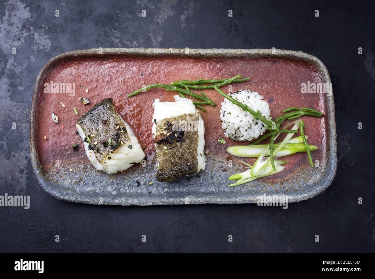 Gourmet fried Japanese skrei cod fish filet with glasswort and furikake ...
