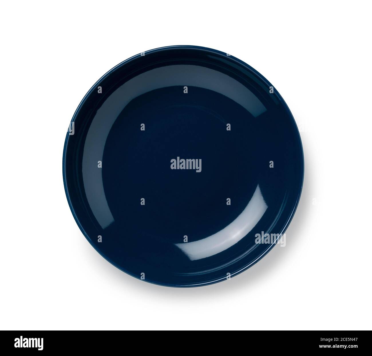 Navy blue plate placed on a white background Stock Photo - Alamy