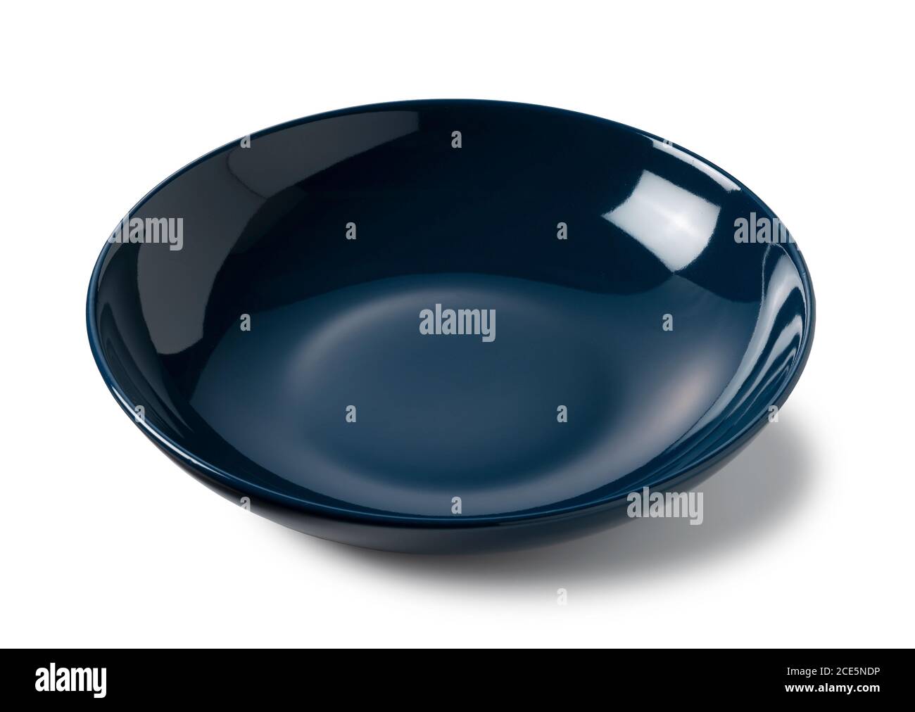 Navy blue plate placed on a white background Stock Photo - Alamy