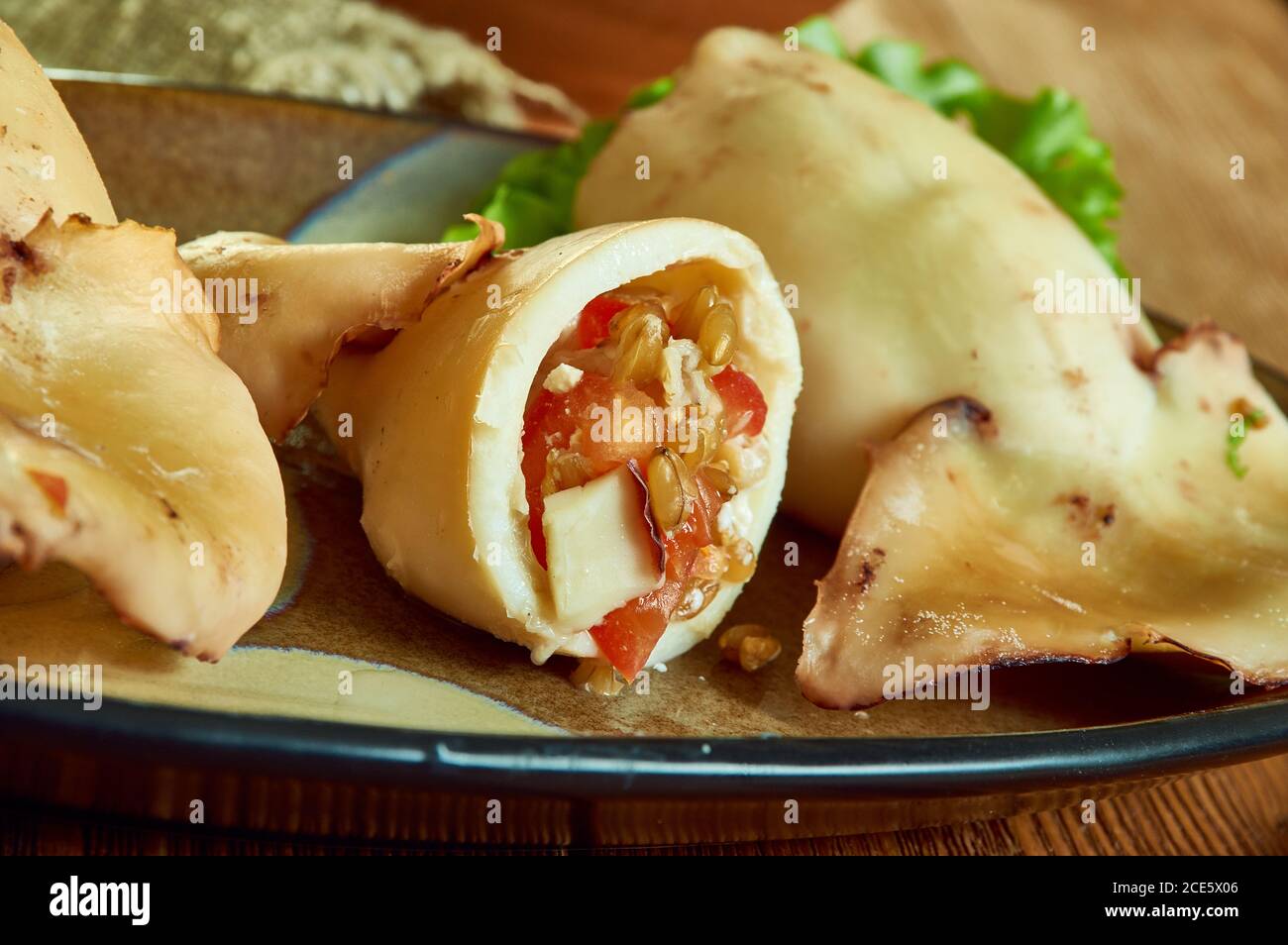 Stuffed calamari Sicilian style Stock Photo - Alamy