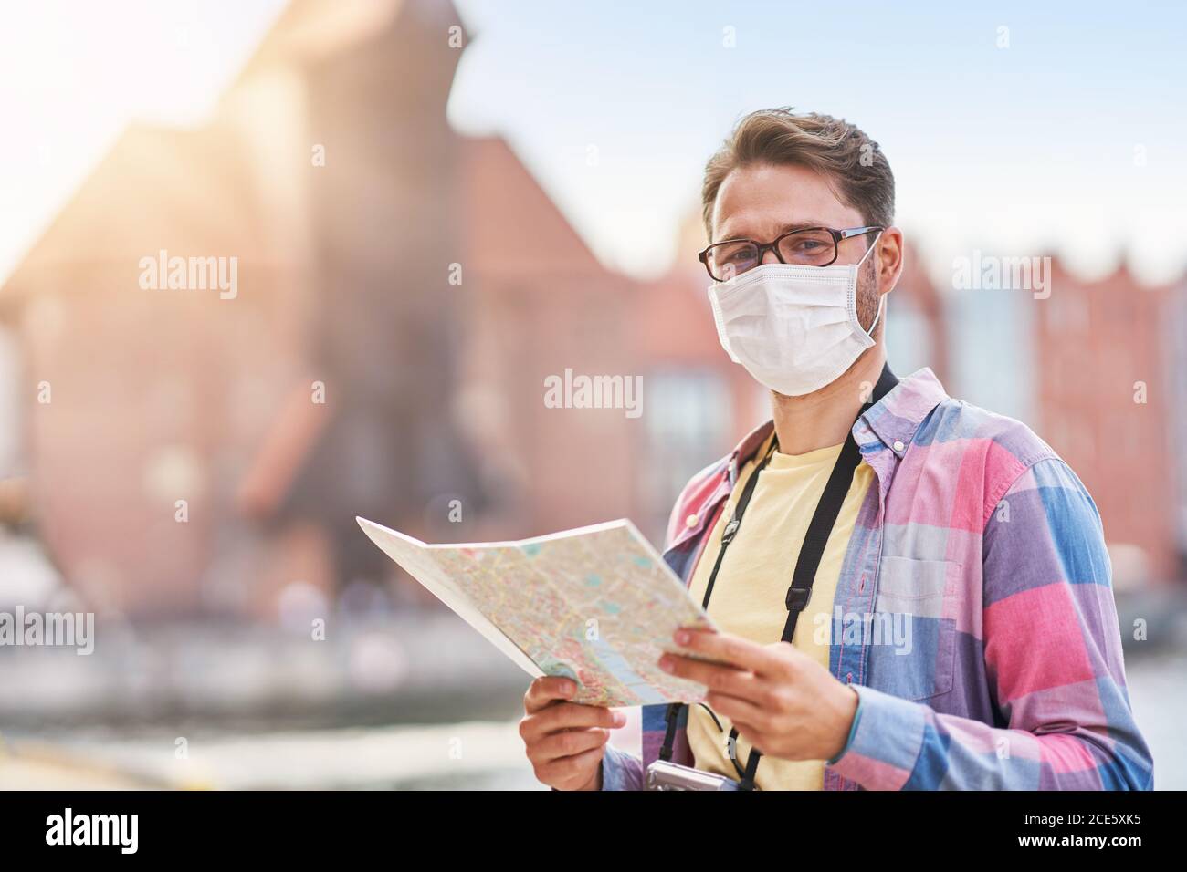 Male tourist in mask sightseeing Gdansk Poland Stock Photo - Alamy