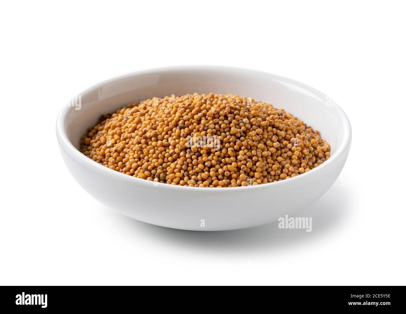 Shooting mustard placed on a white background from an angle Stock Photo ...