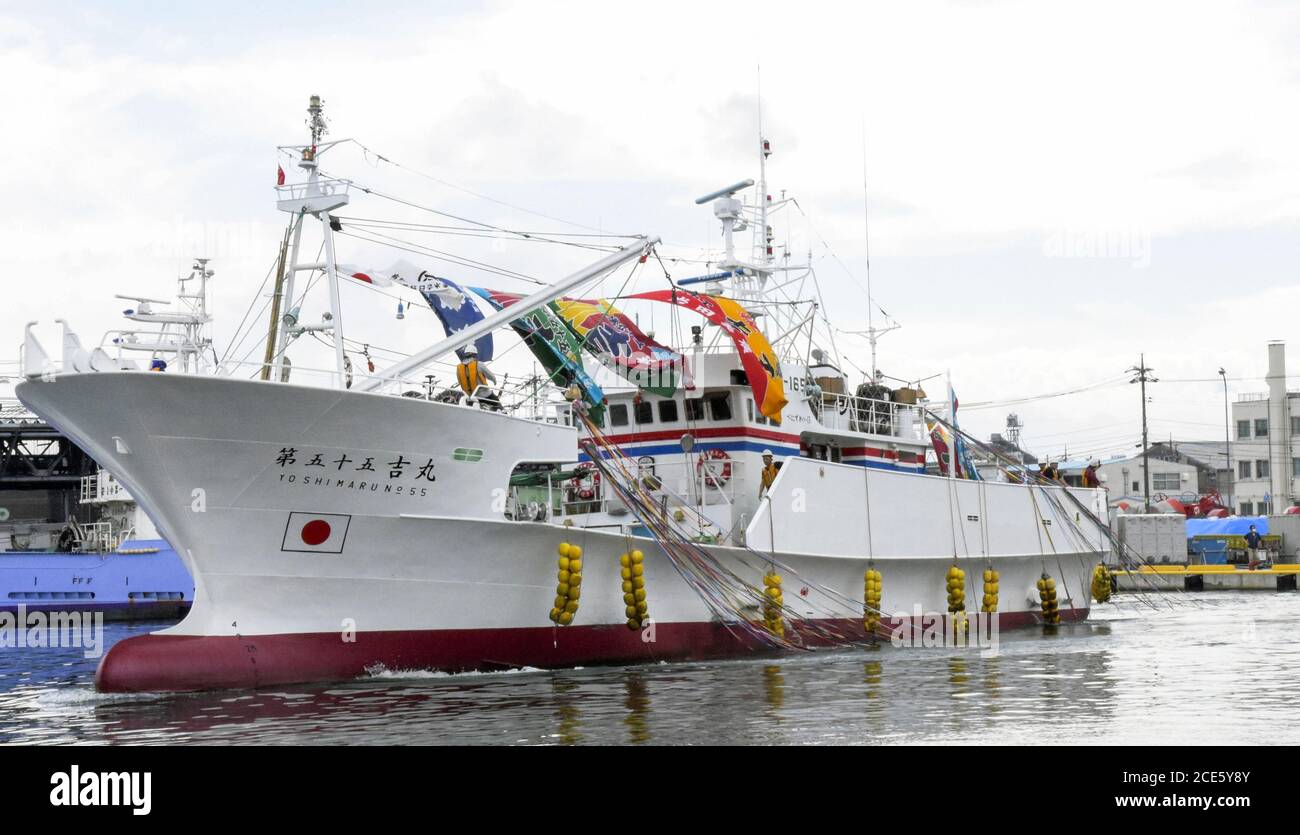 A fishing vessel heads to sea from Sakaiminato port, known for having ...