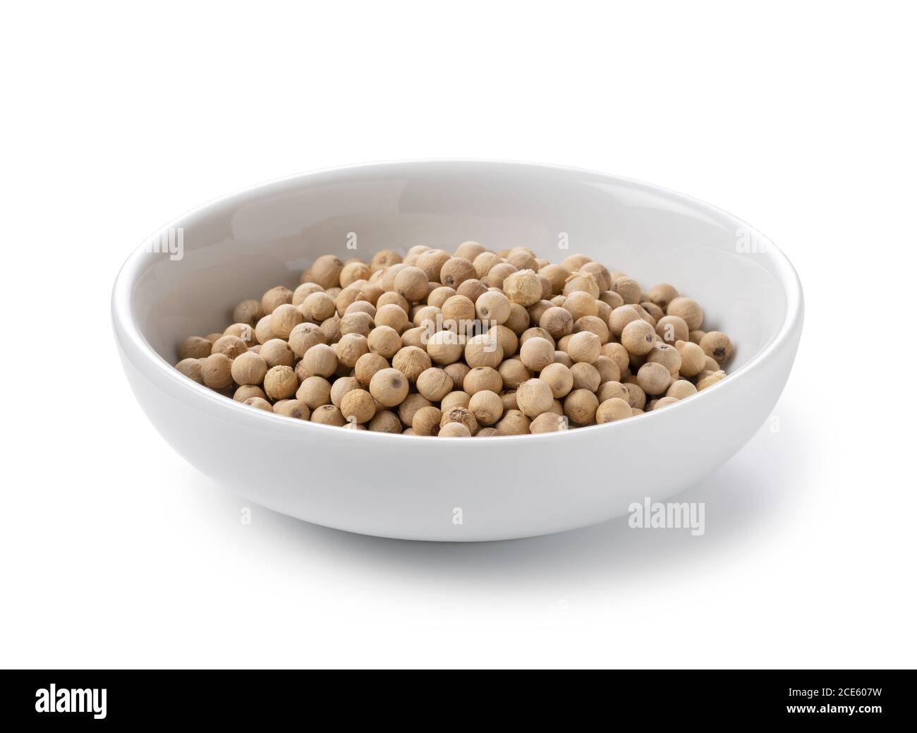 Shooting white pepper on a white background from an angle Stock Photo ...