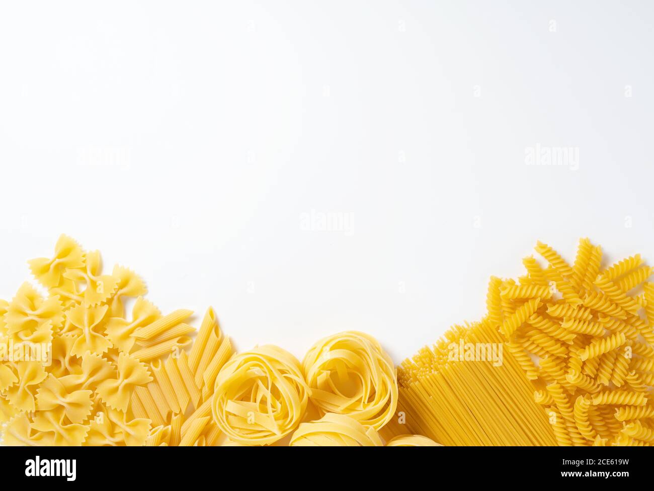 Take a bird's eye view of several types of pasta with copy space Stock ...