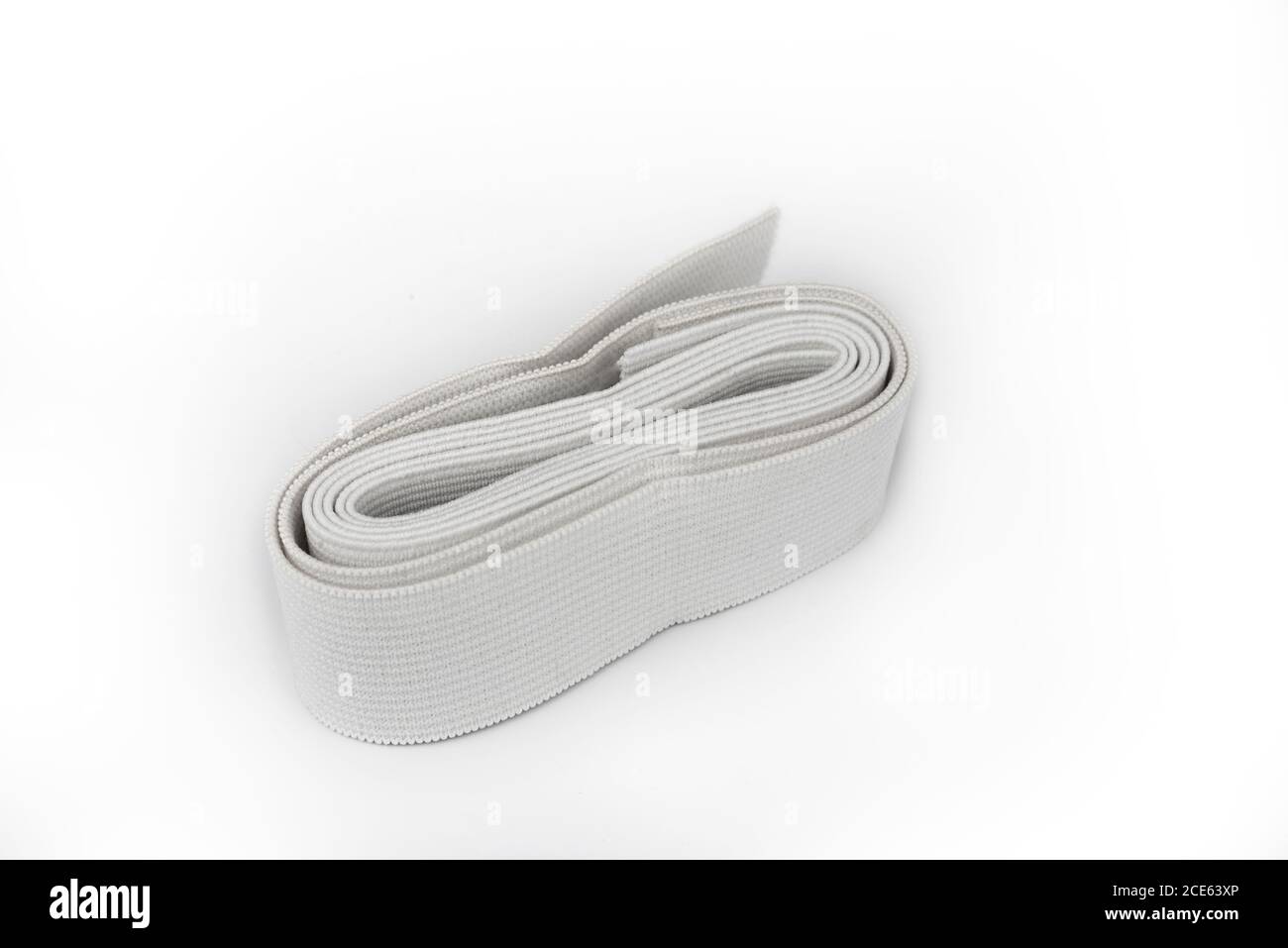 Elastic Textile rubber for clothes on a white Stock Photo - Alamy