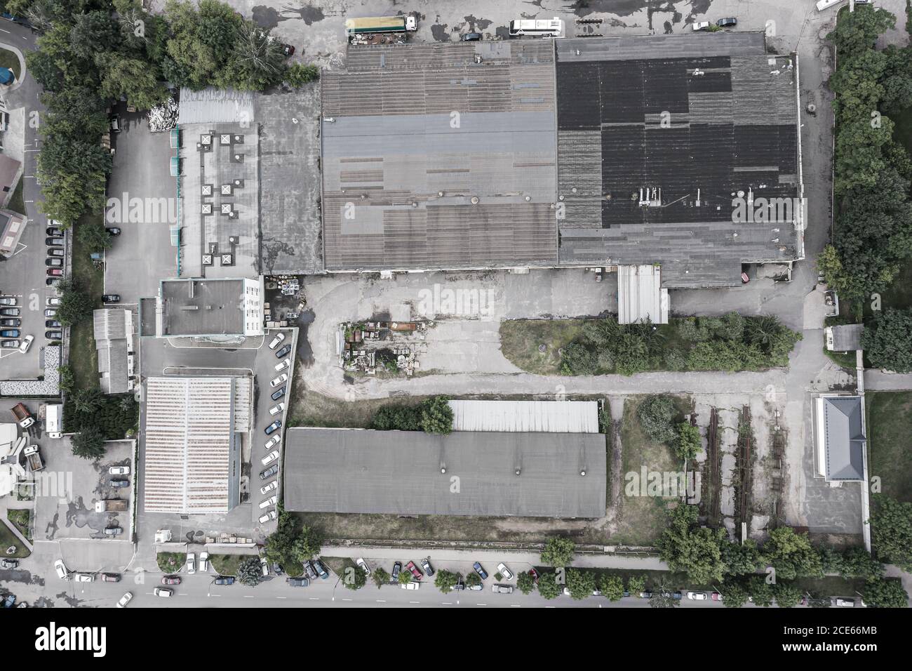 aerial view of urban industrial district with warehouses and buildings ...
