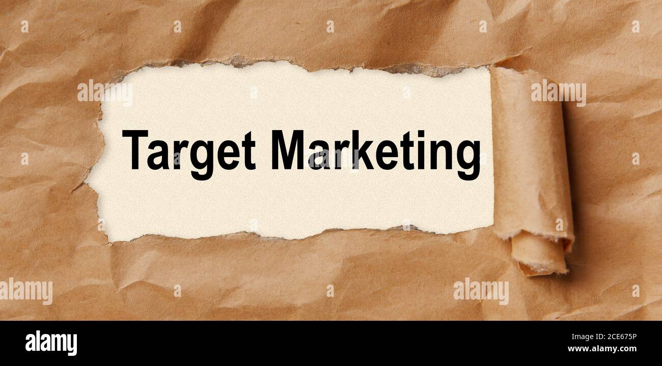 Text Target marketing appearing behind torn brown paper Stock Photo - Alamy