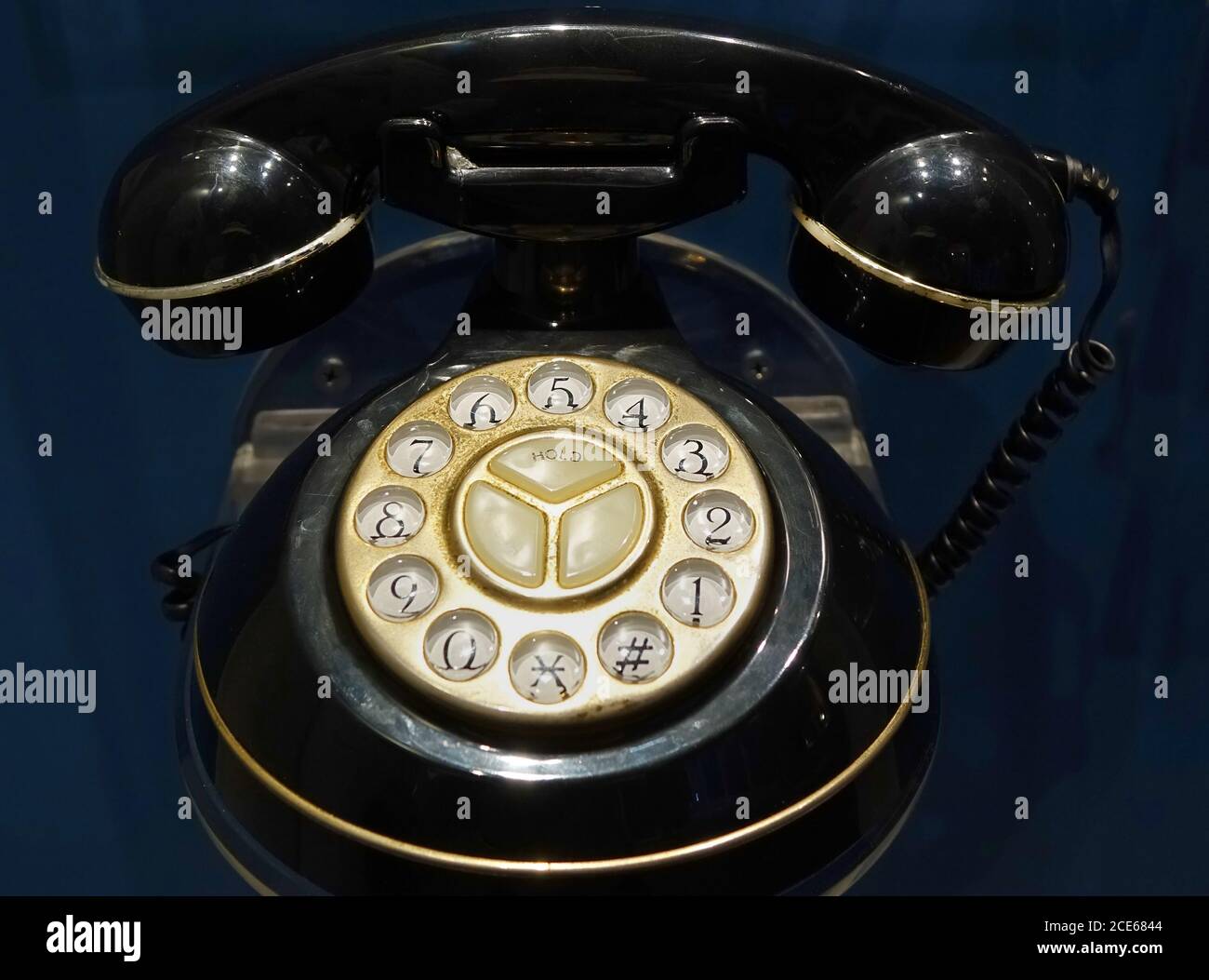 An old rotary dial telephone with black handset Stock Photo - Alamy